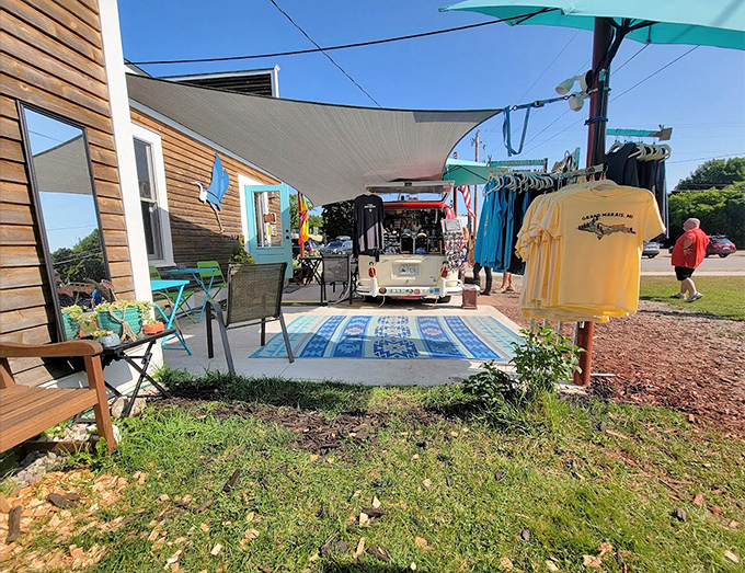 The outdoor seating area invites lingering conversations and lazy afternoons &ndash; a community gathering spot where strangers often leave as friends.