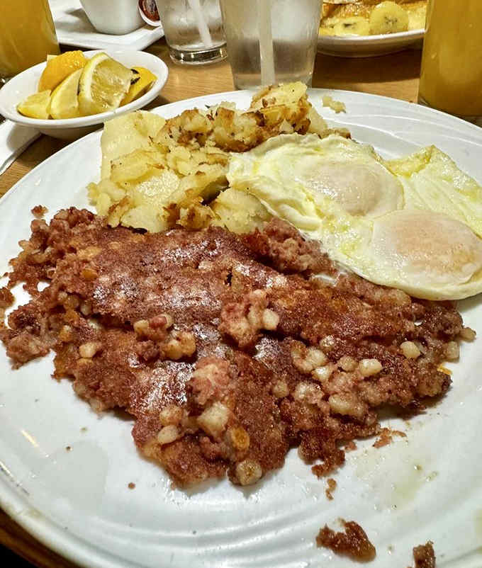 Corned beef hash with eggs &ndash; a savory mountain that makes you question why anyone would ever choose sweet over savory.