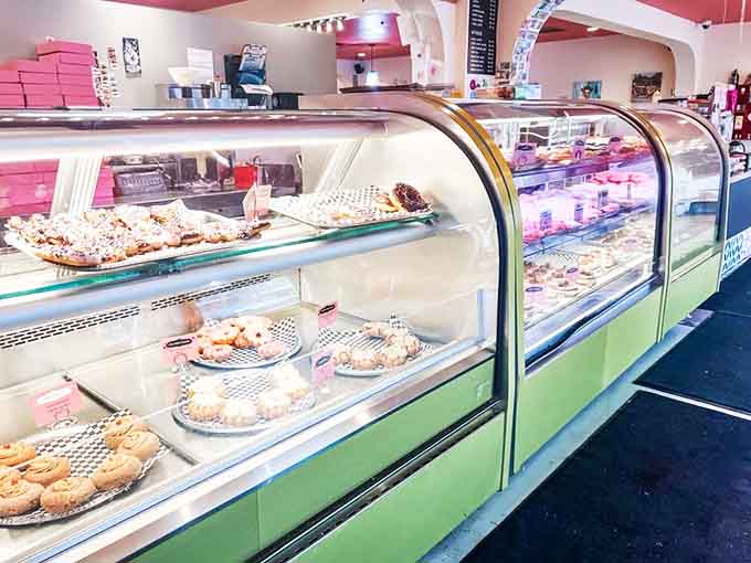 The display case &ndash; a glass-fronted museum of edible art where decisions are impossible and "one of each" becomes a tempting solution.