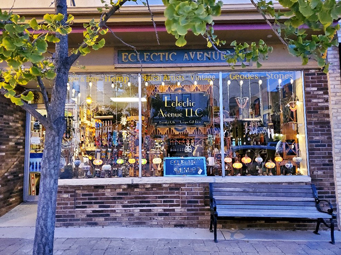 Eclectic Avenue's colorful window display hints at the wonderland of unique gifts and local artistry waiting inside.