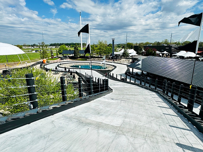Decorative pools add splashes of blue to the concrete landscape, creating oases of color that drivers glimpse as they zoom past.