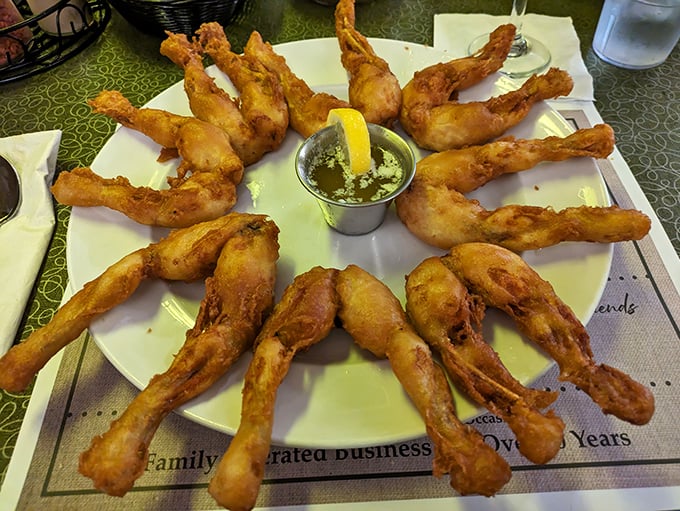Golden-fried frog legs arranged in a circle, offering a taste adventure that's both conversation starter and culinary delight for the adventurous diner.