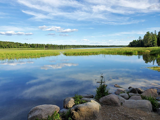 Mirror, mirror on the lake! The perfect stillness creates reflections so clear you'll wonder which way is up in this Minnesota paradise.