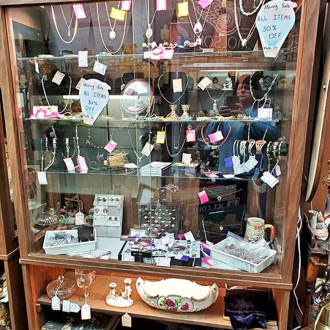 Vintage jewelry displays showcase decades of personal adornment &ndash; from costume pieces to fine metals, each representing someone's special occasion or everyday elegance.