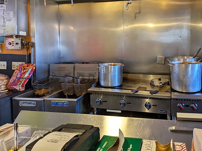 Outdoor seating under mature trees offers a perfect spot to savor your Chicago dog during Minnesota's precious warm months. 