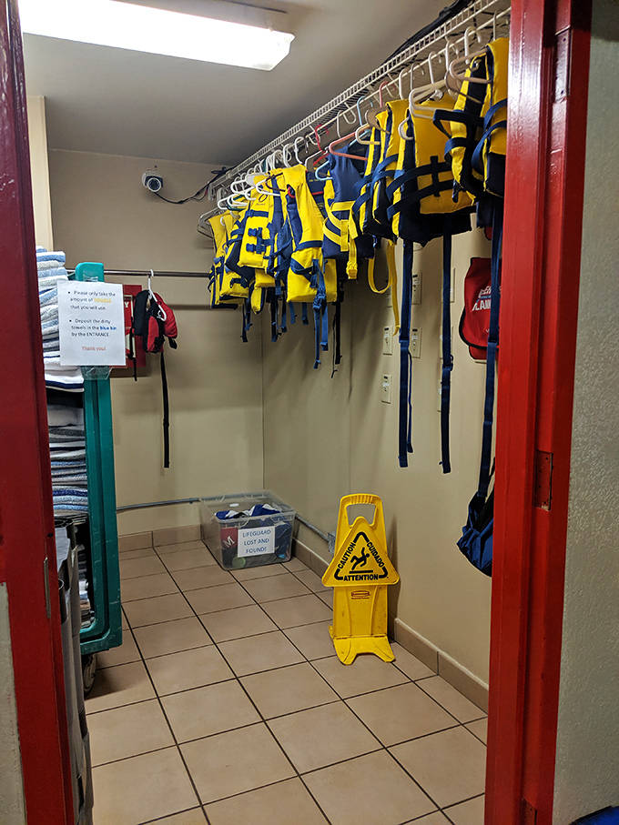 Safety first meets water fun with neatly arranged life jackets, ensuring even the most cautious parents can relax while kids make splash-worthy memories.