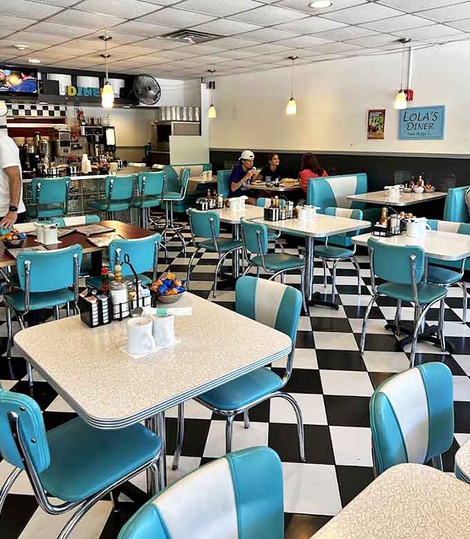 Every angle reveals another perfect vignette of mid-century diner design, from the pendant lighting to the gleaming tabletops.
