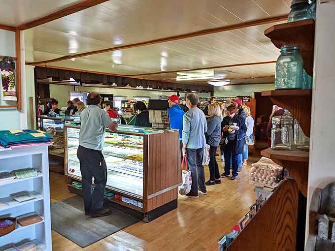 Customers line up patiently, knowing that good things come to those who wait &ndash; especially when those good things include fresh Amish donuts.