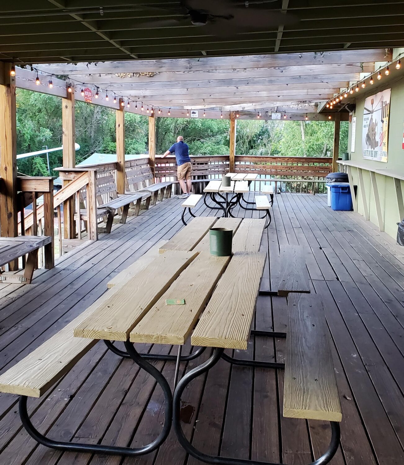 The outdoor deck offers peaceful dining under string lights &ndash; a perfect spot to enjoy Wisconsin summer evenings with a cold one.