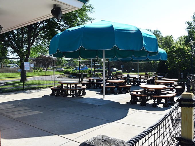 Between splashes, these shaded picnic areas become command centers for snack breaks and sunscreen reapplication.