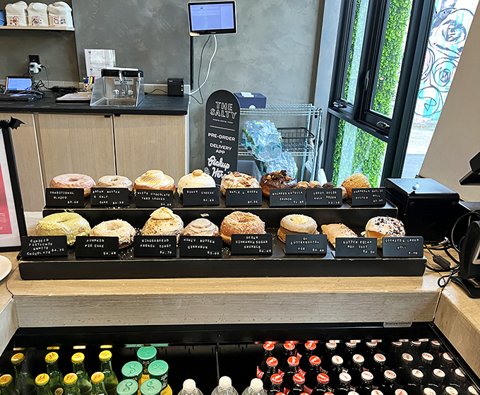 A pastry case that doubles as an art gallery &ndash; each donut variety labeled with the care usually reserved for museum exhibits.