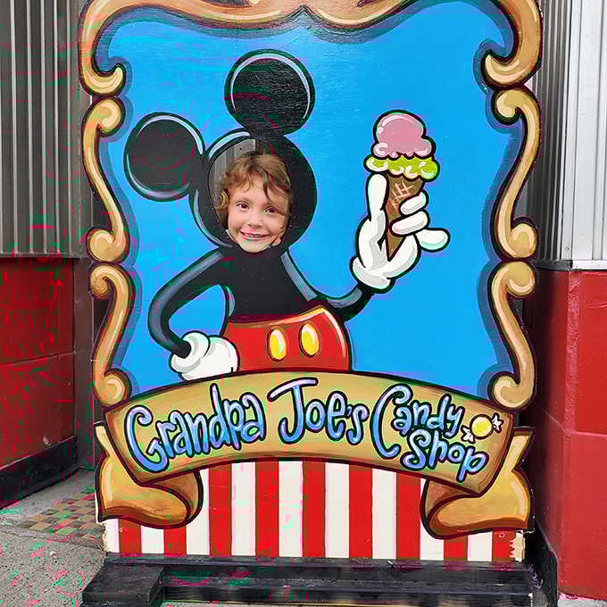 This Mickey-inspired cutout transforms visitors into cartoon characters, proving that at Grandpa Joe's, even the memories come with sprinkles.