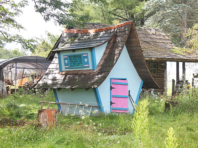 A pop of pink brightens this tiny blue dwelling, proving that even gnomes appreciate a splash of unexpected color.