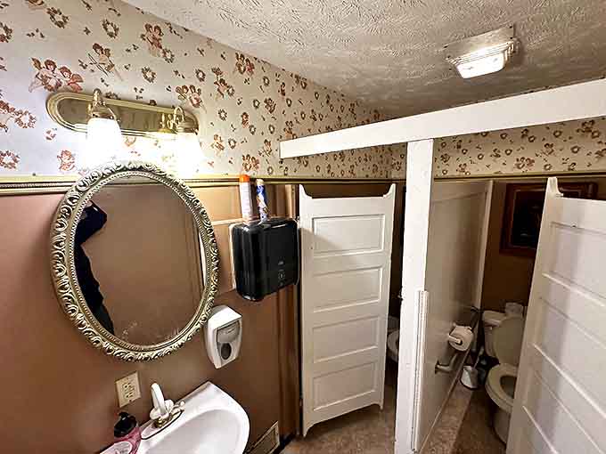 Bathrooms blend vintage charm with modern necessities, maintaining historical character while providing the comforts today's travelers expect.