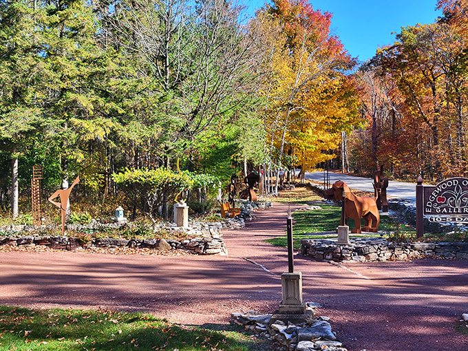 Fall foliage creates the perfect backdrop for this elegant metal sculpture &ndash; nature providing the finishing touches to human creation.