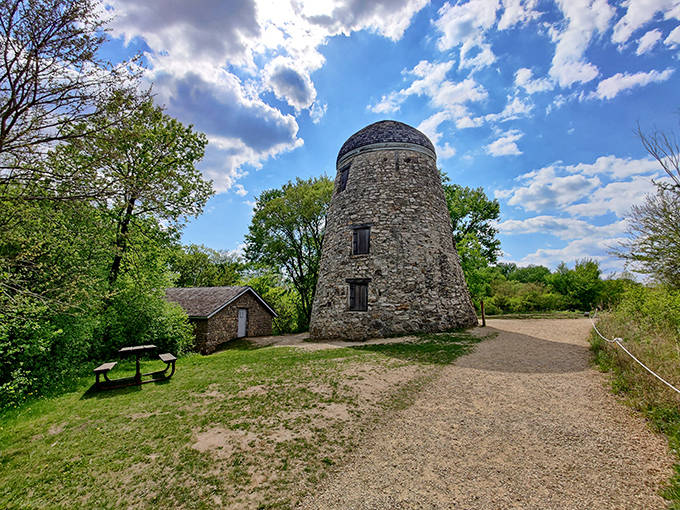 Seppman Mill stands as a stone sentinel overlooking the prairie, looking like it was plucked straight from a European countryside postcard.