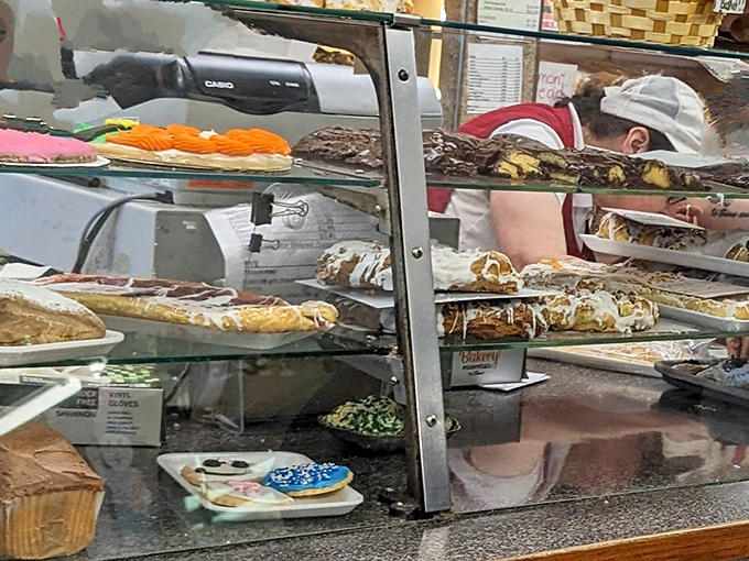 The working bar area buzzes with activity, serving up cold beers and friendly conversation.