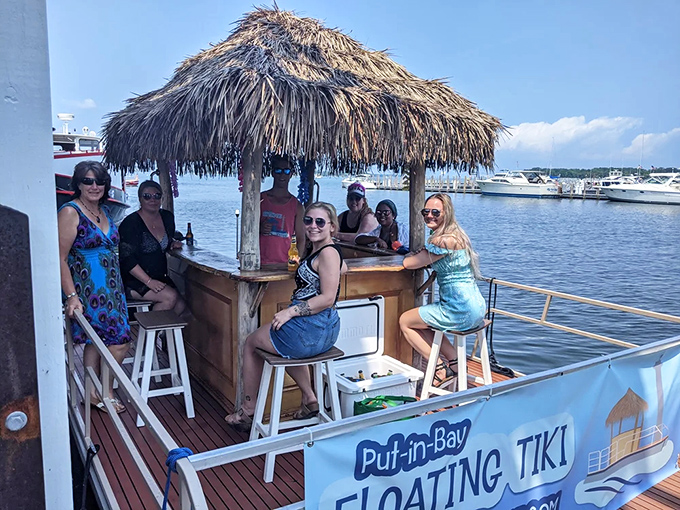 Island hospitality afloat! Guests gather around the bamboo bar, creating memories that will last long after the anchor's raised.