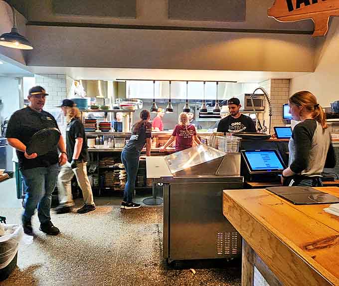 Behind the scenes, the kitchen team orchestrates barbecue magic with the precision and passion of true meat maestros.