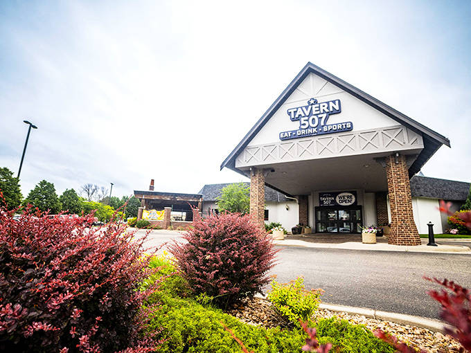 Tavern 507 welcomes visitors with landscaped grounds that hint at the warm hospitality waiting inside this popular local watering hole.