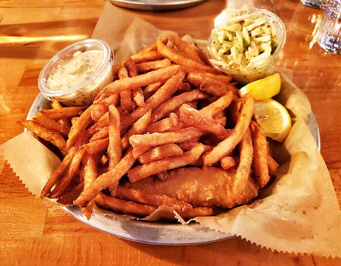 Golden-battered fish with perfectly crisp fries&mdash;a classic done right, with just enough lemon to brighten each delicious bite.