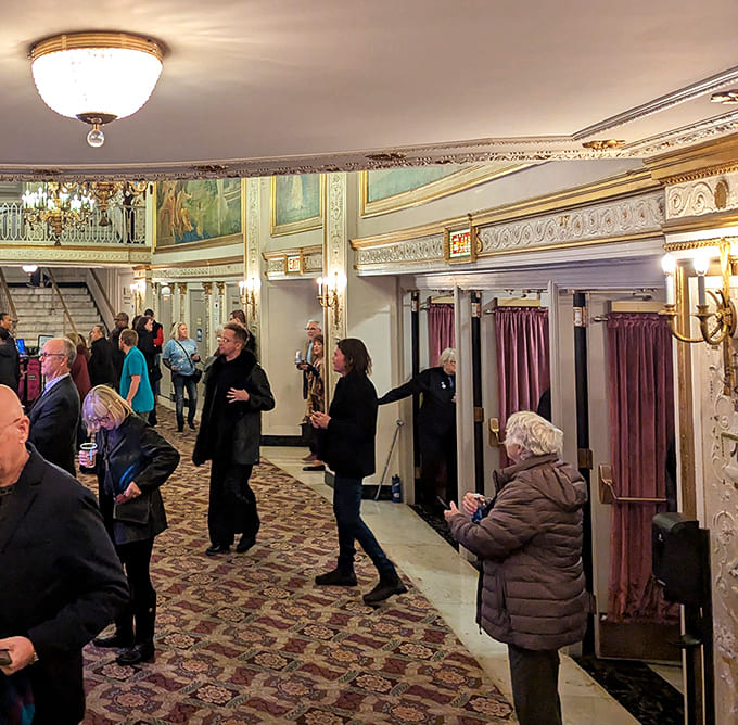 During intermission, patrons gather in spaces where generations before them have discussed performances, creating an unbroken cultural conversation.
