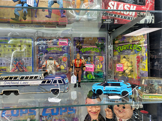 Childhood encased in plastic: Vintage toys and collectibles wait patiently behind glass for someone to exclaim, "I had that!"