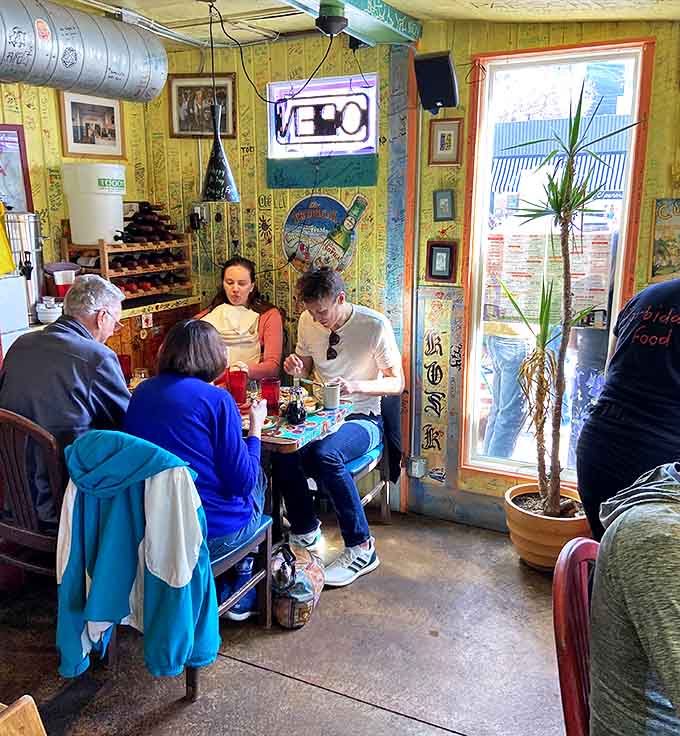 Diners enjoying their Cuban feast &ndash; the expressions of delight tell you everything you need to know about the food.