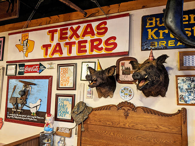 The Texas Taters sign presides over a wall that's part hunting lodge, part roadside attraction, and completely, authentically American.