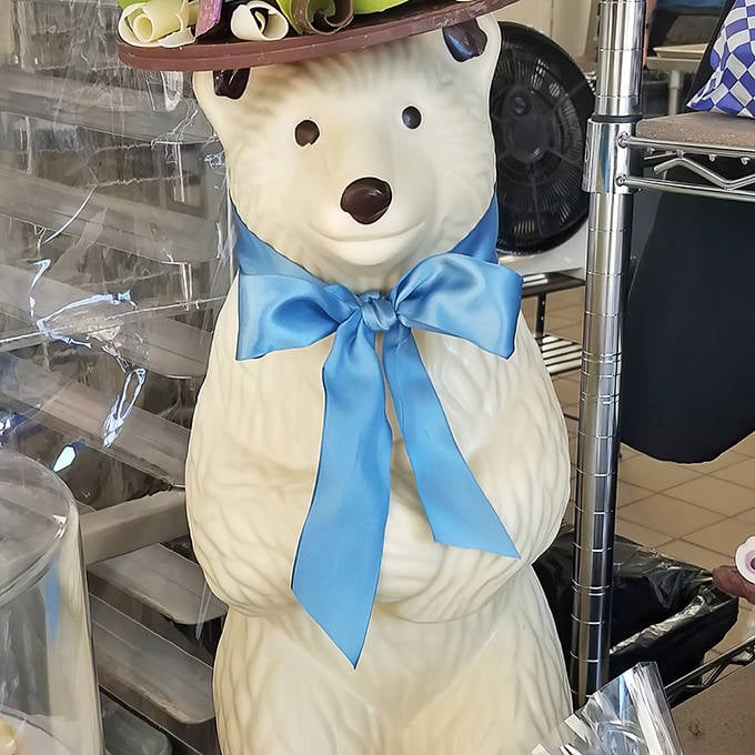 The shop's mascot stands guard &ndash; this white chocolate bear with his jaunty blue bow tie watches over the sweet proceedings.