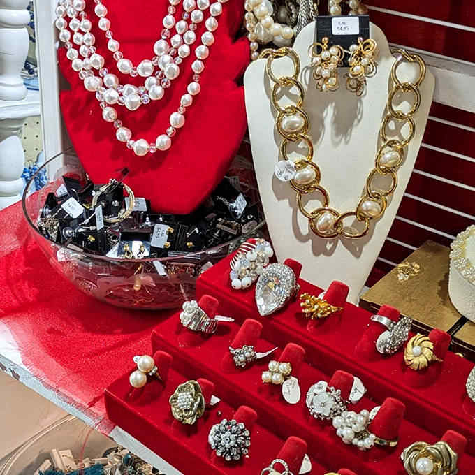 Costume jewelry and accessories sparkle under display lights, each piece ready for its second act adorning a new generation.