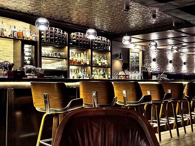 The bar wall showcases decades of local history &ndash; each sign and photo telling stories that get better with each retelling.