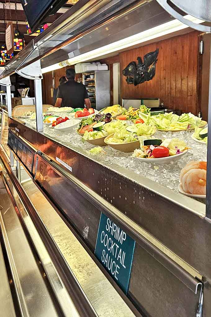 A salad bar that actually looks fresh and inviting, offering enough variety to let you pretend you're eating healthy before hitting the beef station.