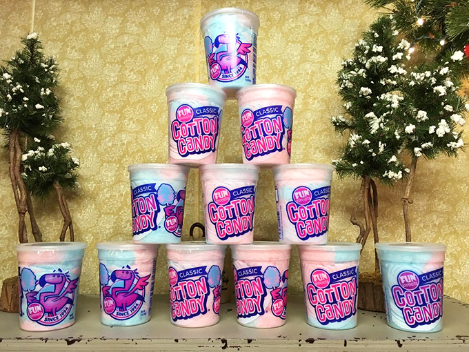 Cotton candy tubs stacked like pastel clouds, promising that magical moment when sugar transforms into edible air.