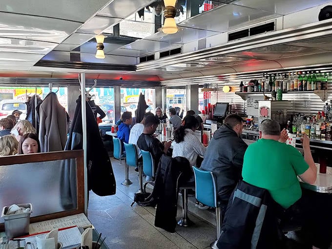 A cross-section of humanity united by the universal language of "this food is so good I'm temporarily ignoring my phone."