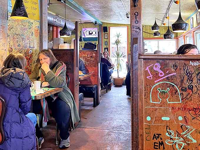 Diners deep in conversation, surrounded by vibrant decor &ndash; at Victor's, the food brings people together and the atmosphere keeps them lingering.