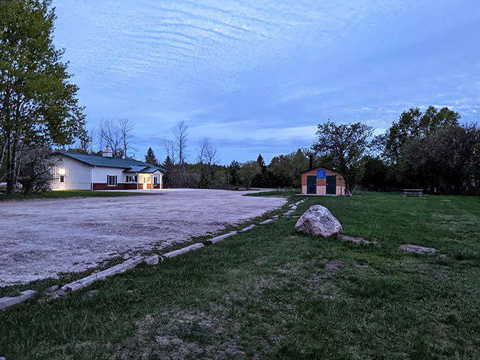 Twilight settles over Norwood Township Park, transforming everyday buildings into silhouettes worthy of a postcard.