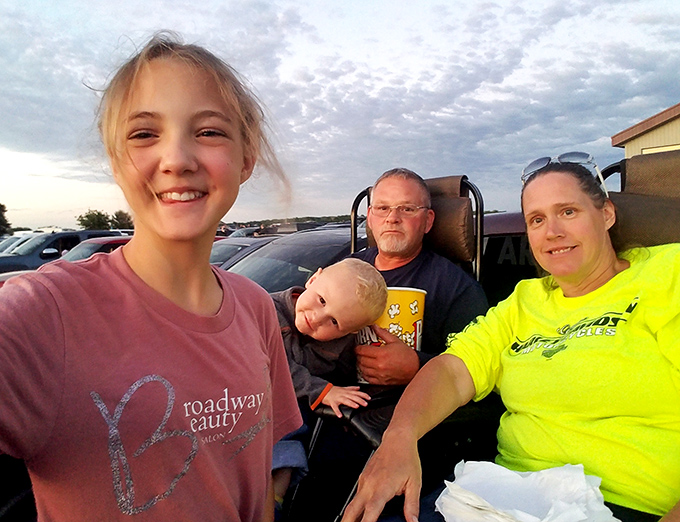 Families create memories that span generations, proving the timeless appeal of movies under the stars.