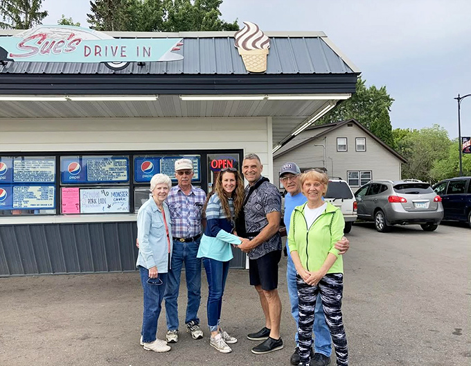 Families gather outside Sue's Drive-In, creating memories that will last long after the last drop of ice cream is gone.