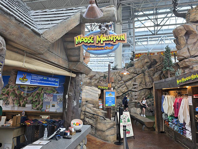 Moose Mountain's rustic entrance welcomes adventurers with woodland charm &ndash; the perfect transition from shopping spree to putting paradise.