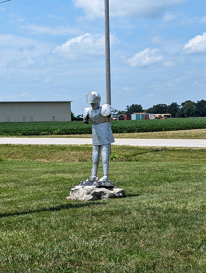 The knight statue stands guard nearby, creating a whimsical medieval tableau in this most unexpected roadside attraction.