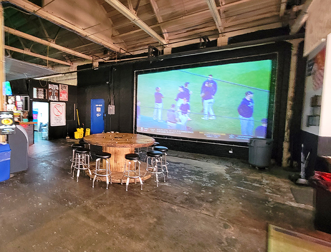 When you need a break from throwing, the massive projection screen offers sports entertainment &ndash; meta-level athletics for the fowling enthusiast.