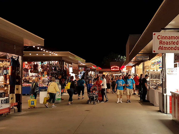 As darkness falls, the International Bazaar transforms into a twinkling wonderland where shopping becomes even more magical under strings of lights.