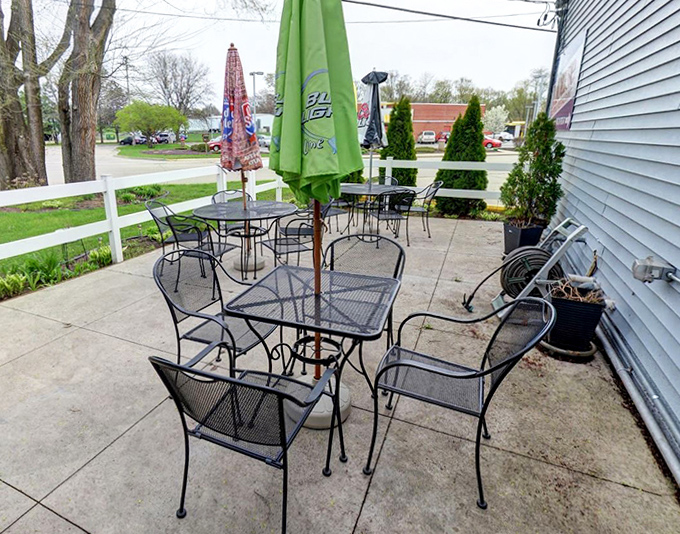 The outdoor patio provides a seasonal escape &ndash; simple metal tables under colorful umbrellas create the perfect spot to enjoy Wisconsin's all-too-brief summer months with food and friends.