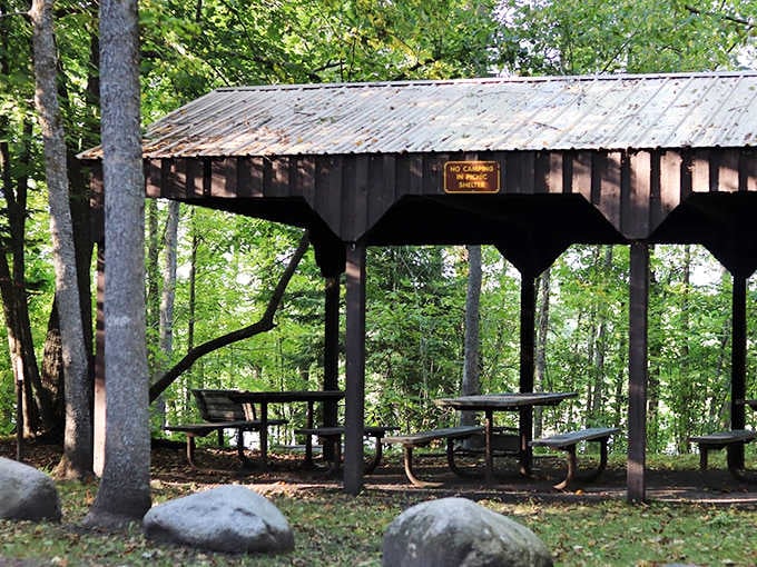 This shaded pavilion offers respite from summer sun while keeping nature's beauty in full view &ndash; picnicking elevated to an art form.