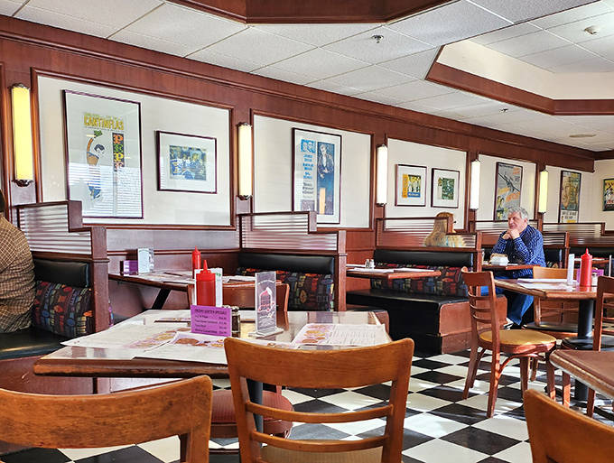 Movie posters and memorabilia line the walls, creating a museum-like atmosphere that celebrates America's love affair with diners and drive-ins.