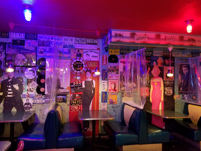 The booth area feels like sitting inside a time capsule, with iconic images and memorabilia creating a feast for the eyes.