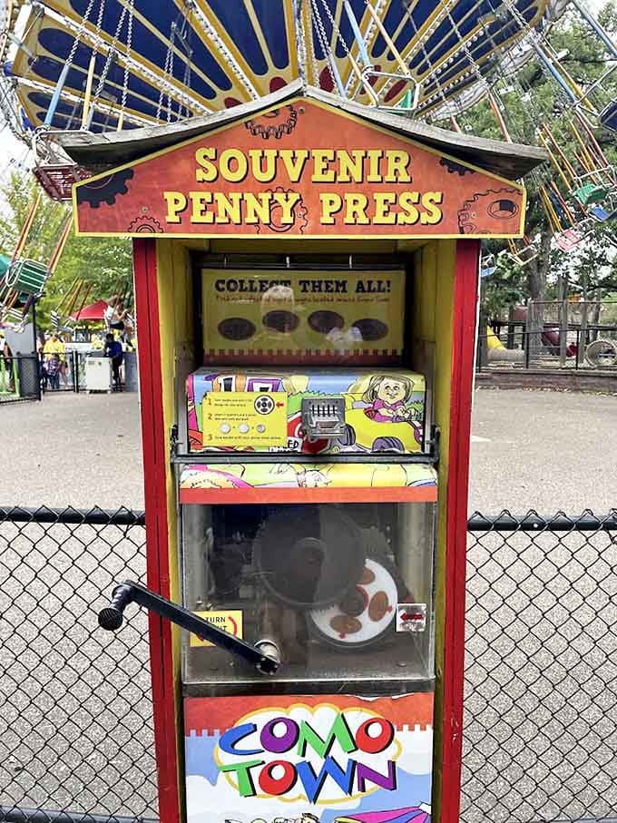 The penny press machine creates instant souvenirs that somehow become treasured keepsakes, despite costing less than your morning coffee.