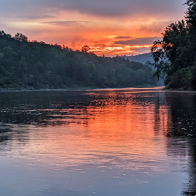 Sunset transforms the St. Croix into liquid fire, a daily miracle that's been repeating itself since long before anyone was around to witness it.
