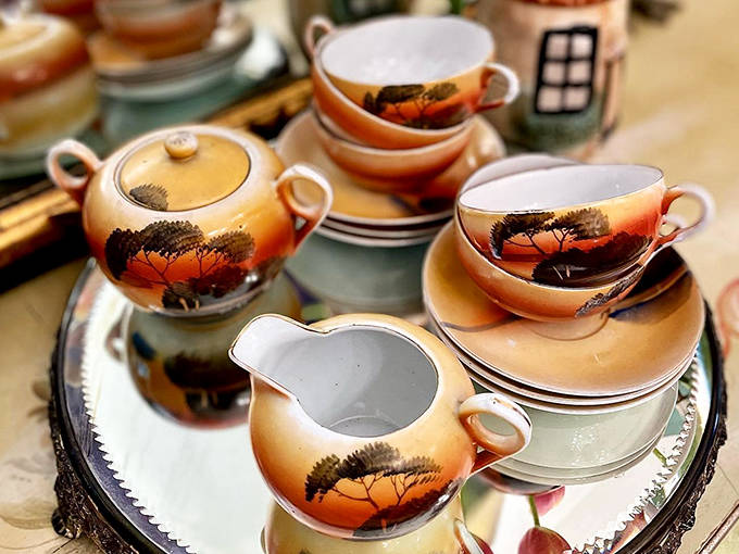 This hand-painted tea set with its sunset landscape design transforms an ordinary afternoon cuppa into a moment of transported elegance.